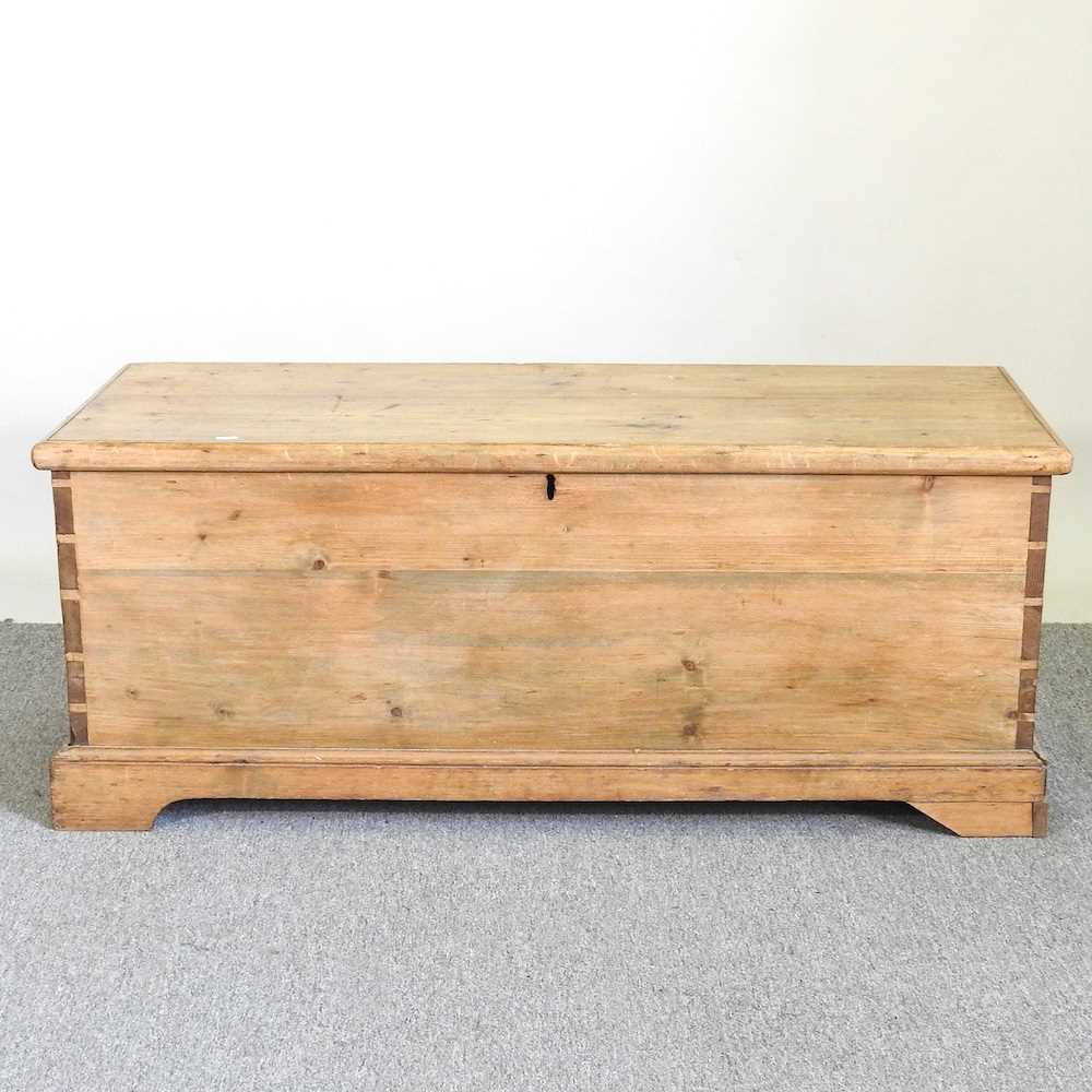Lot 206 - A 19th century pine box, with a hinged lid,