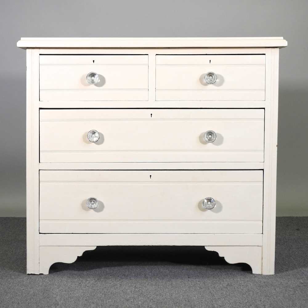 Lot 301 - A modern cream painted chest of drawers,