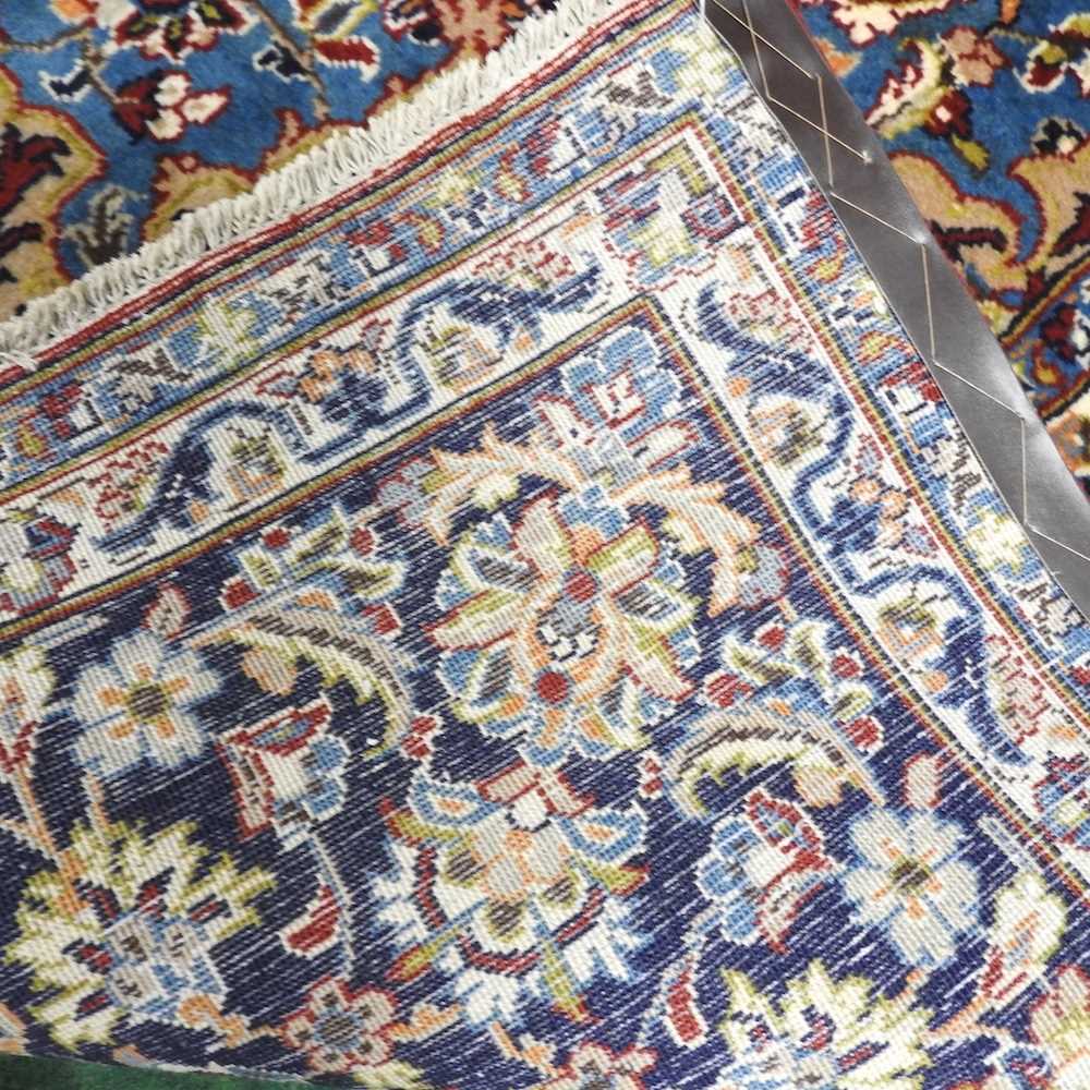 Lot 381 - A Persian Isfahan carpet, with all over