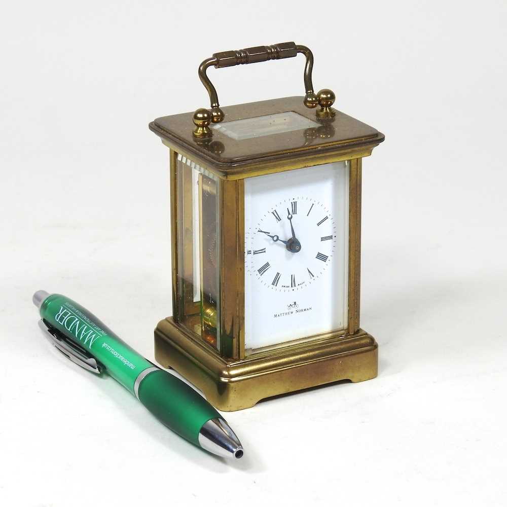 Lot 31 - A brass cased miniature carriage clock, 20th