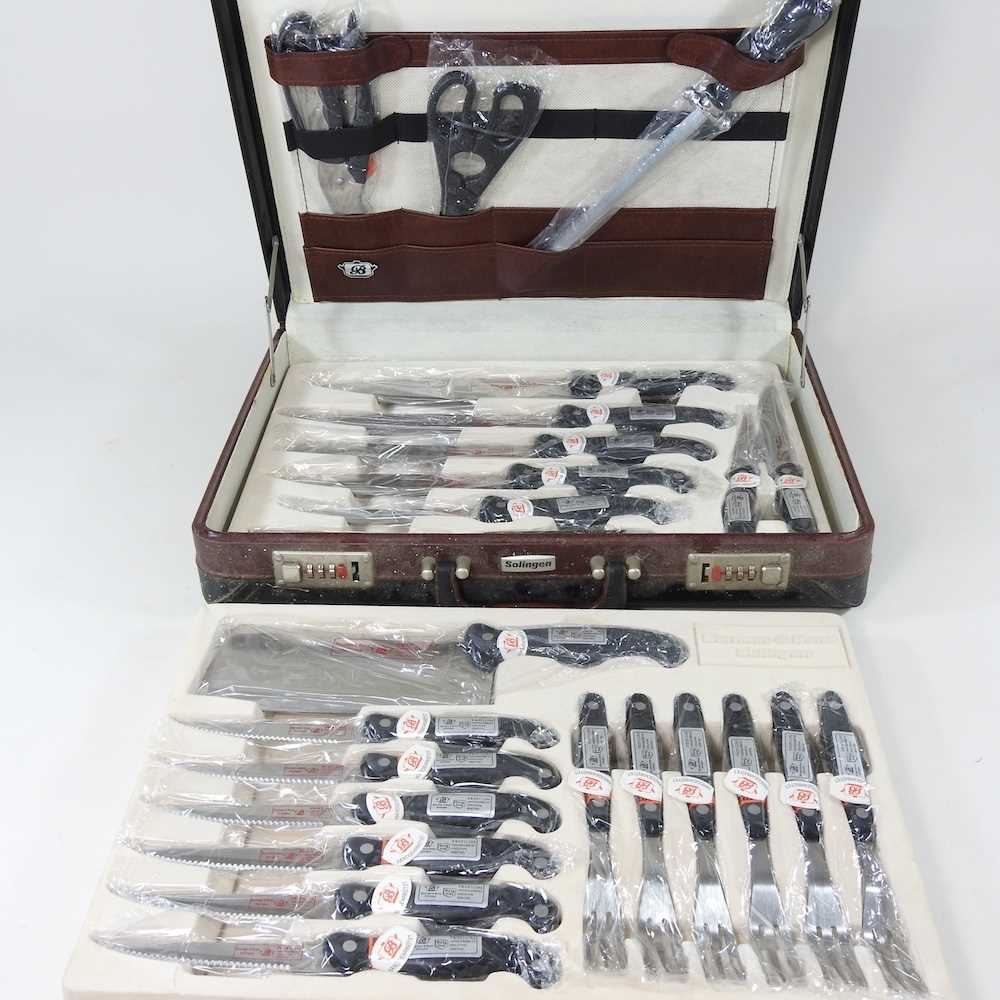 Lot 262 - A Solingen chef's knife set, cased, 45cm