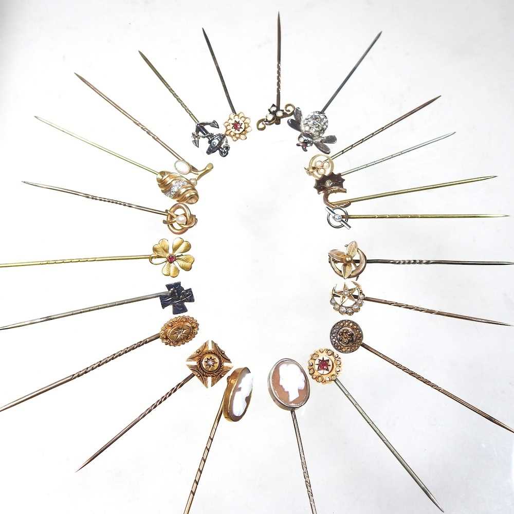 Lot 218 - A collection of mostly 19th century tie pins,