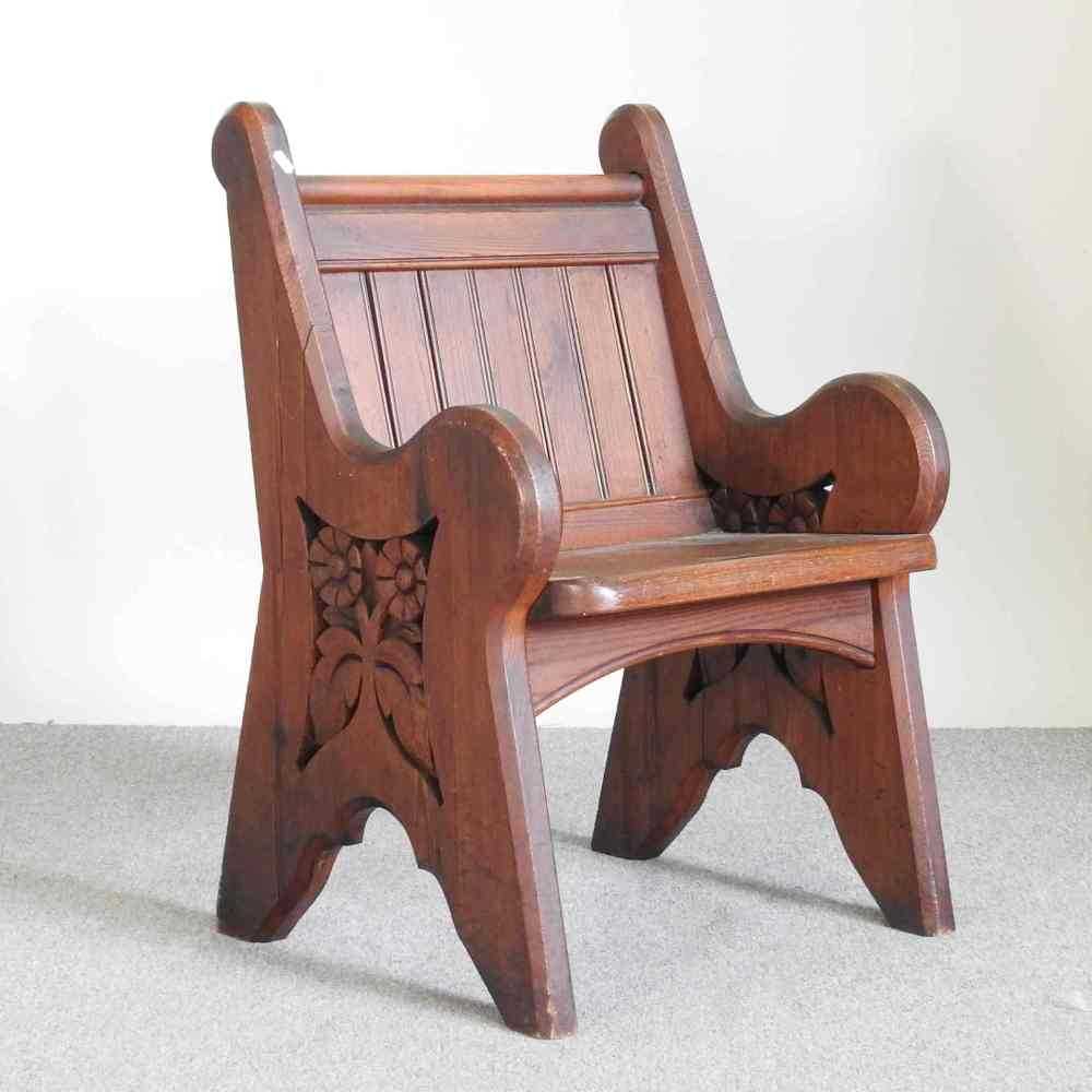 Lot 461 - A 19th century Gothic style pew, with carved