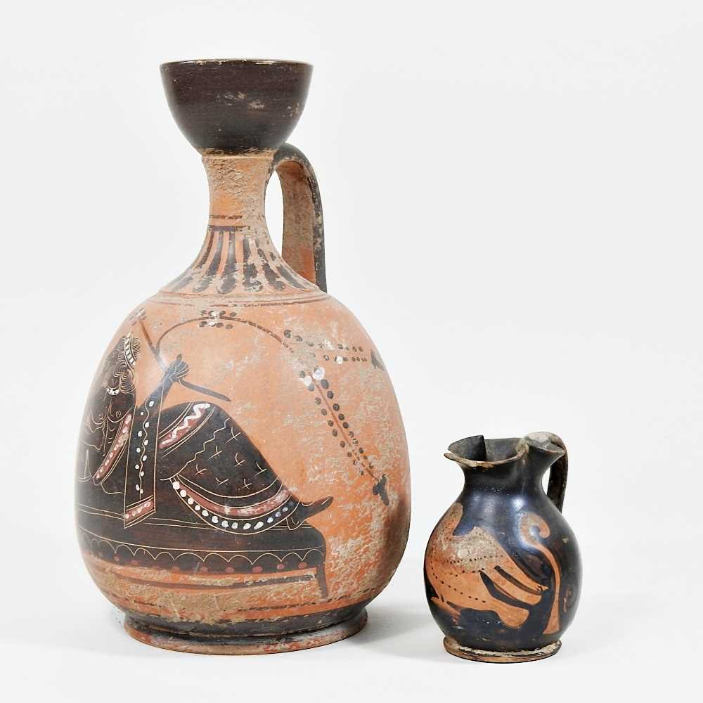 Lot 65 - A Greek archaic style terracotta ewer,