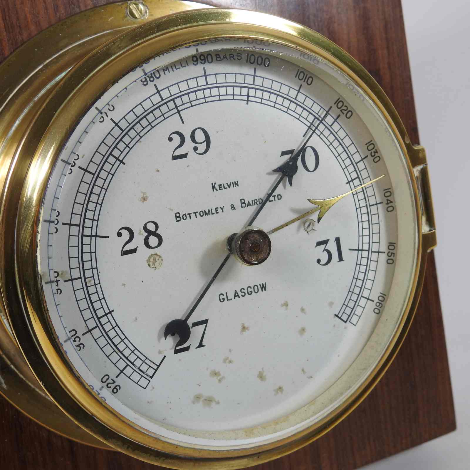 Lot 2 - A brass cased ship's barometer, the six inch