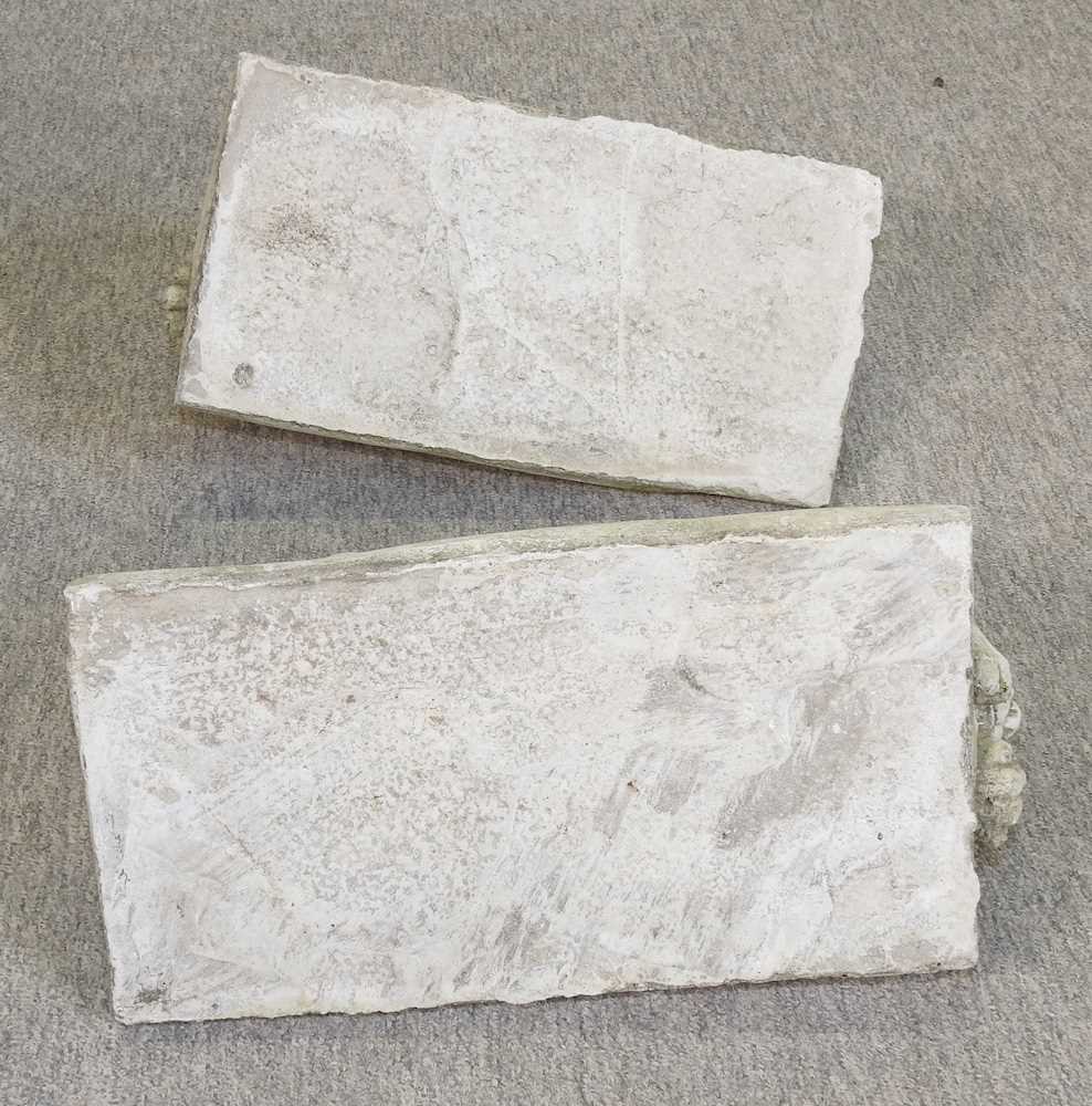 Lot 472 - A pair of reconstituted stone models of