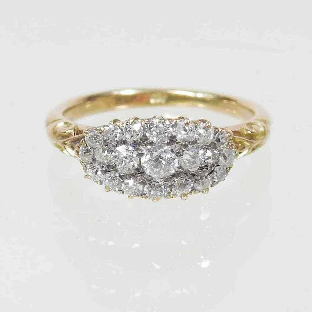 Lot 303 - A diamond cluster ring, of elliptical shape,