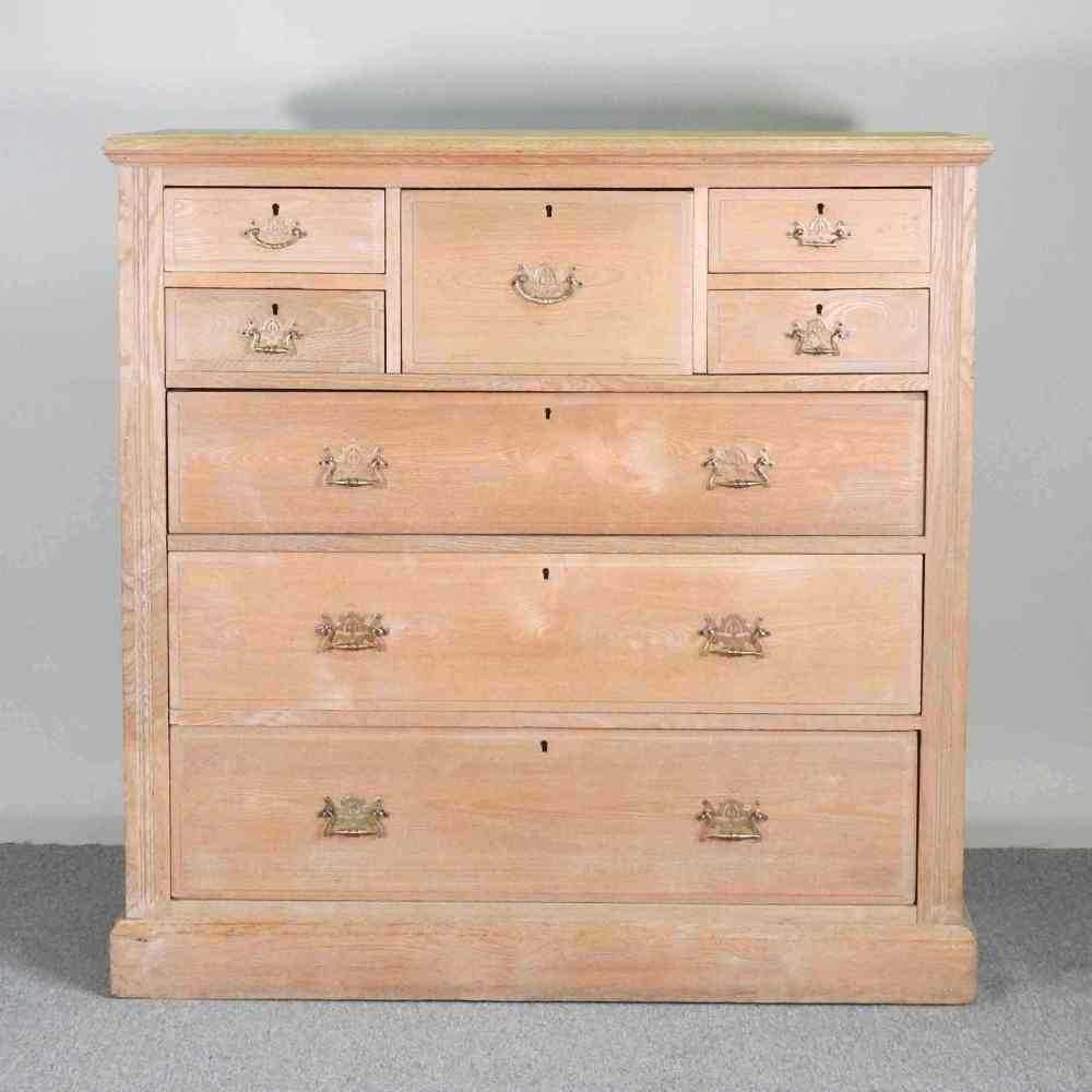 Lot 106 - A large late Victorian ash chest, containing
