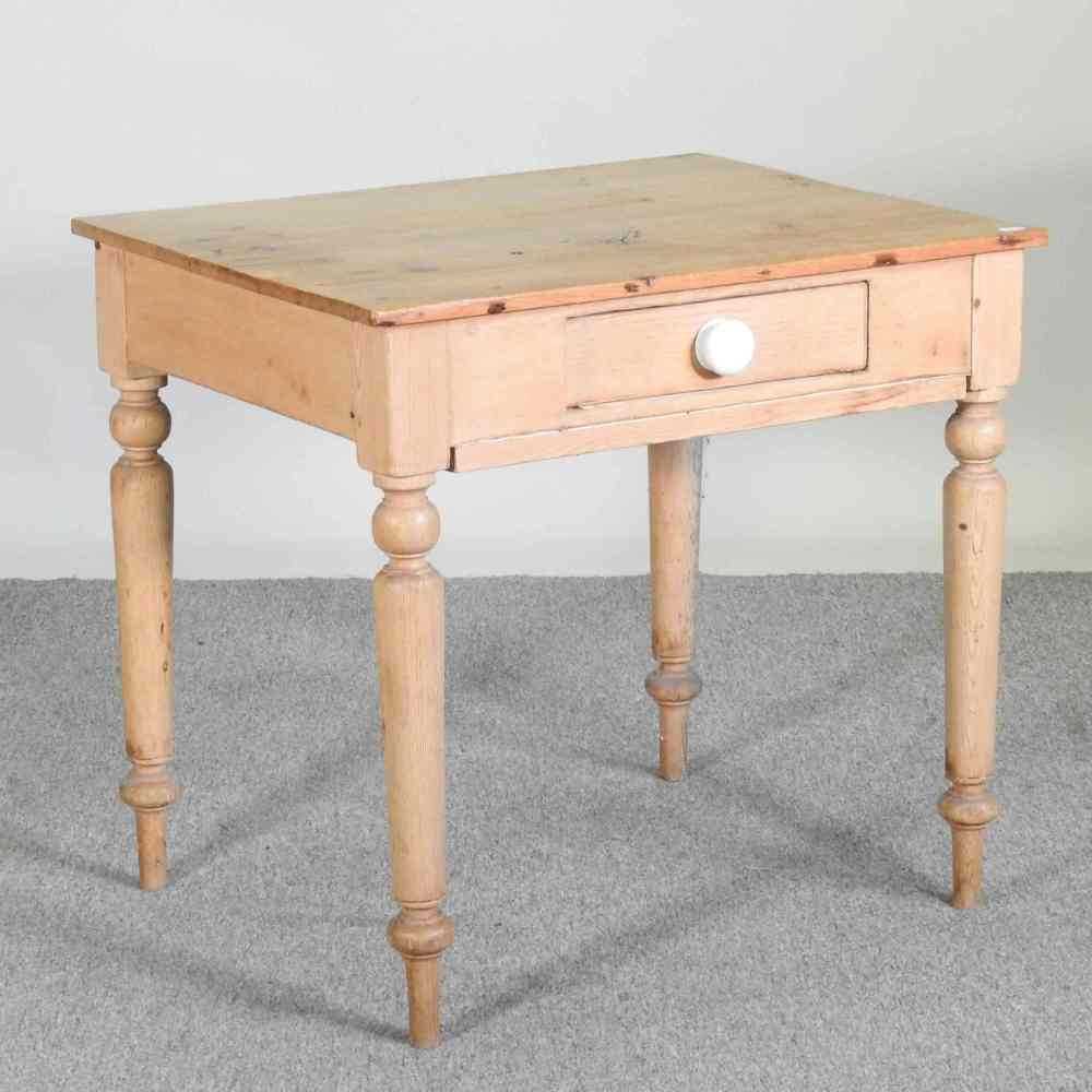 Lot 492 - An antique pine side table, with a single
