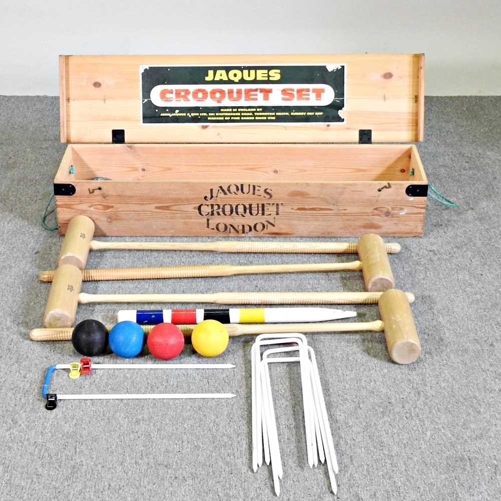 Lot 375 - A Jaques croquet set, in a wooden box, 111cm