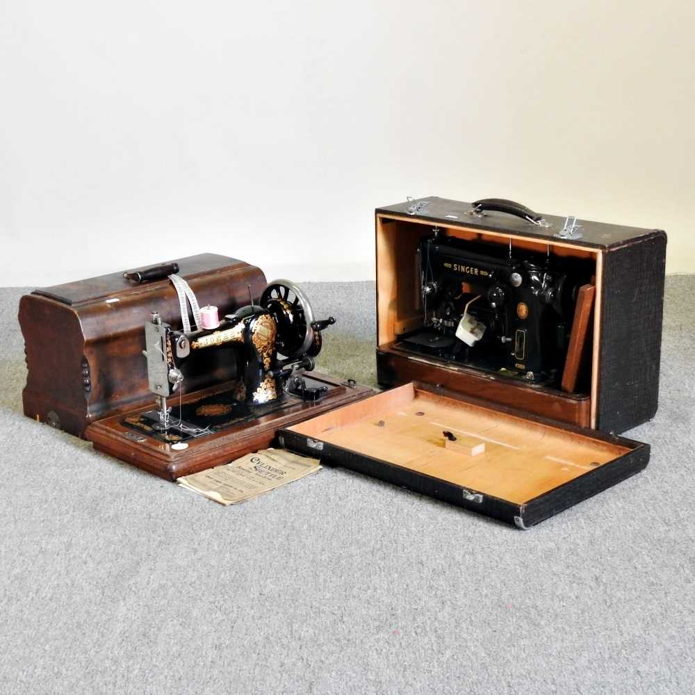 Lot 118 - An early 20th century sewing machine, cased,