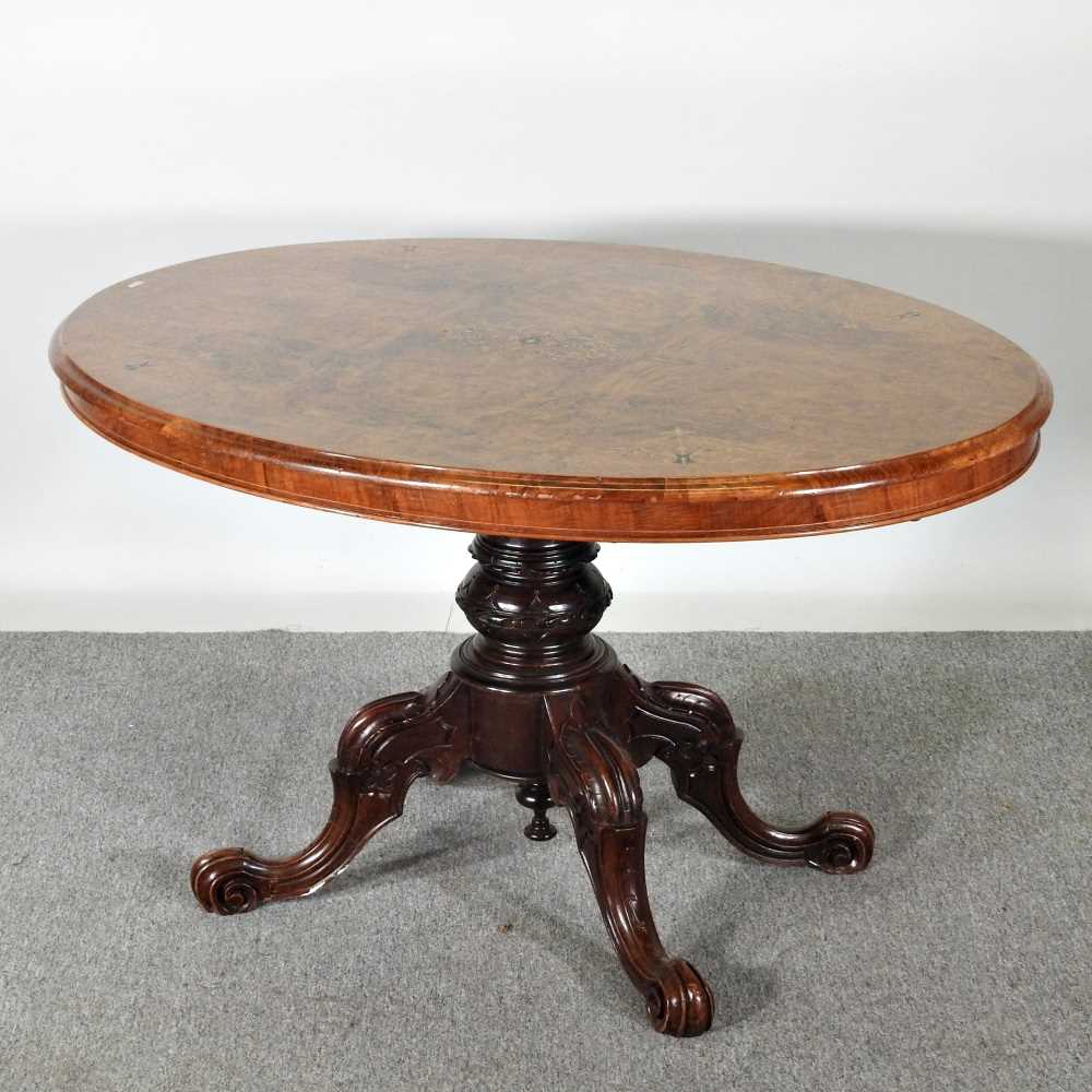 Lot 324 - A Victorian burr walnut loo table with a