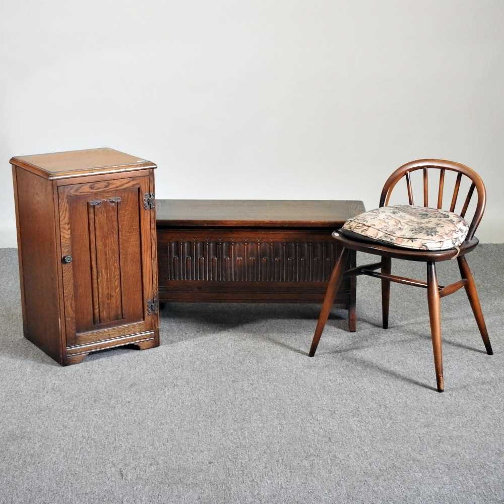 Lot 329 - A 1970's Ercol dark elm dressing table stool,