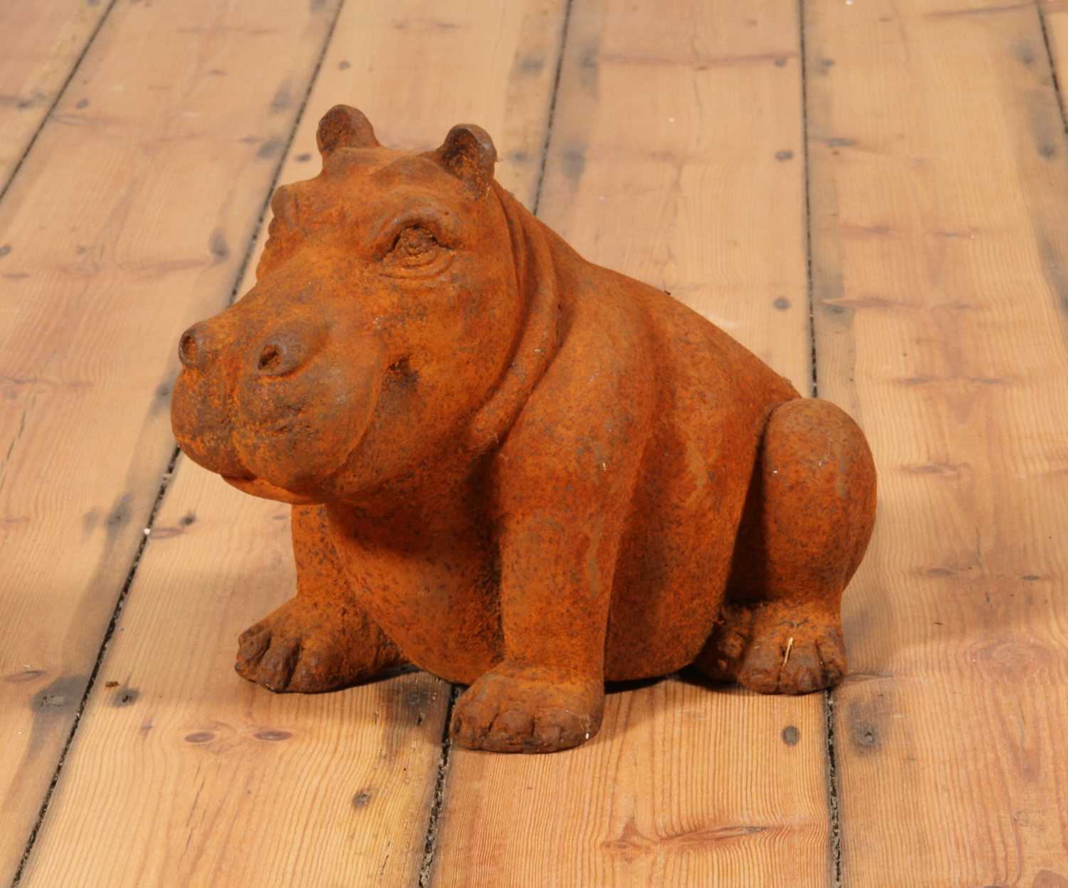 Lot 390 - A rusted iron model of a hippo, h.28cm