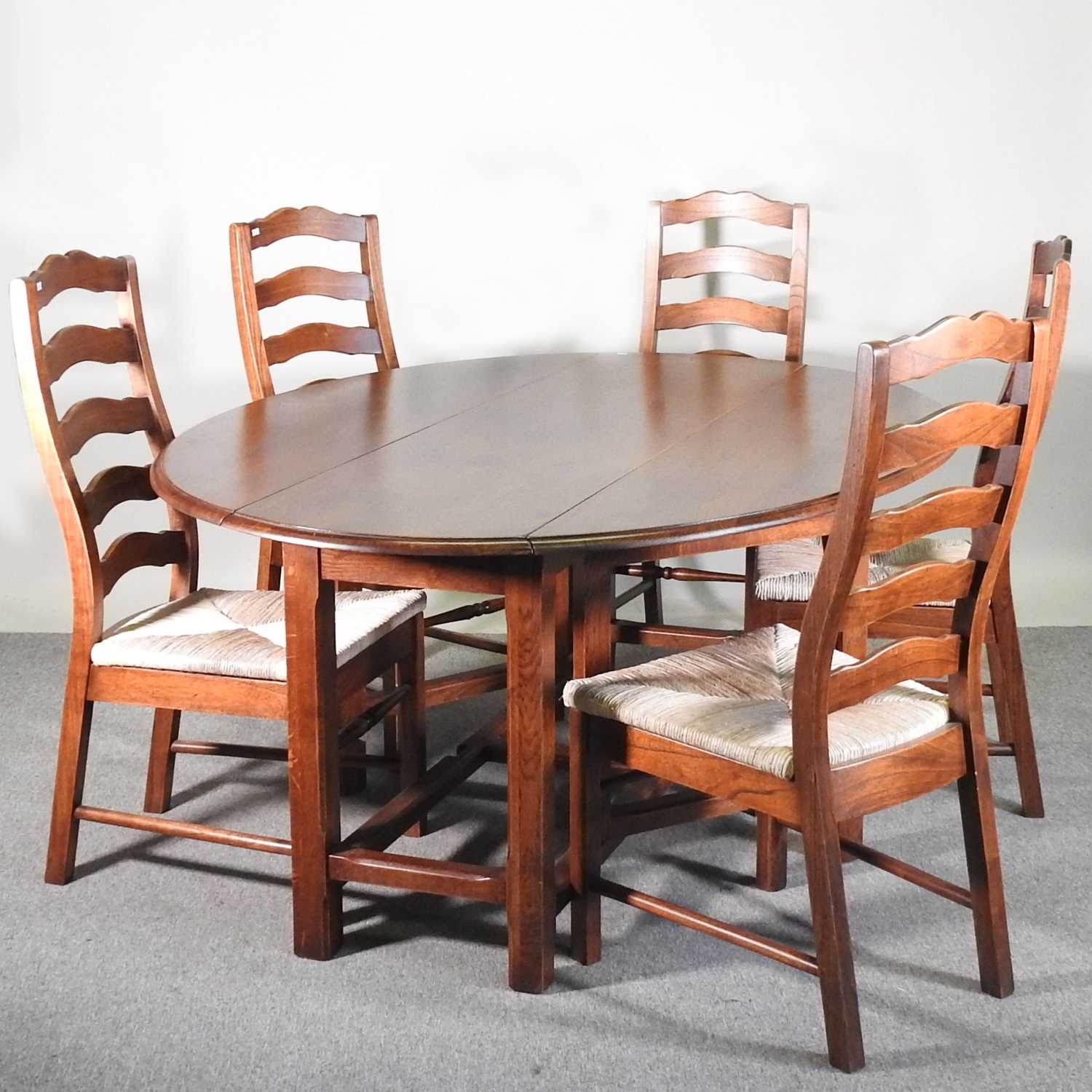 Lot 164 - An oak drop leaf dining table, 179cm wide