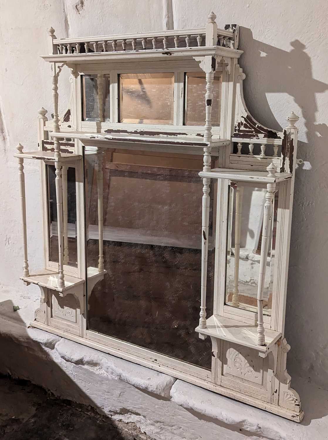 Lot 205 - An Edwardian overmantel mirror, later white