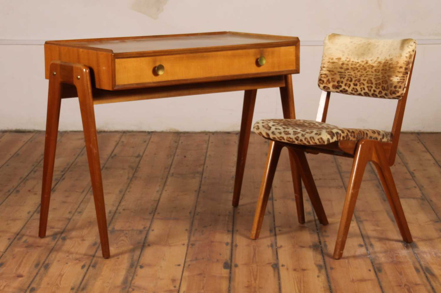 Lot 79 - A Berick teak desk, mid 20th century, having