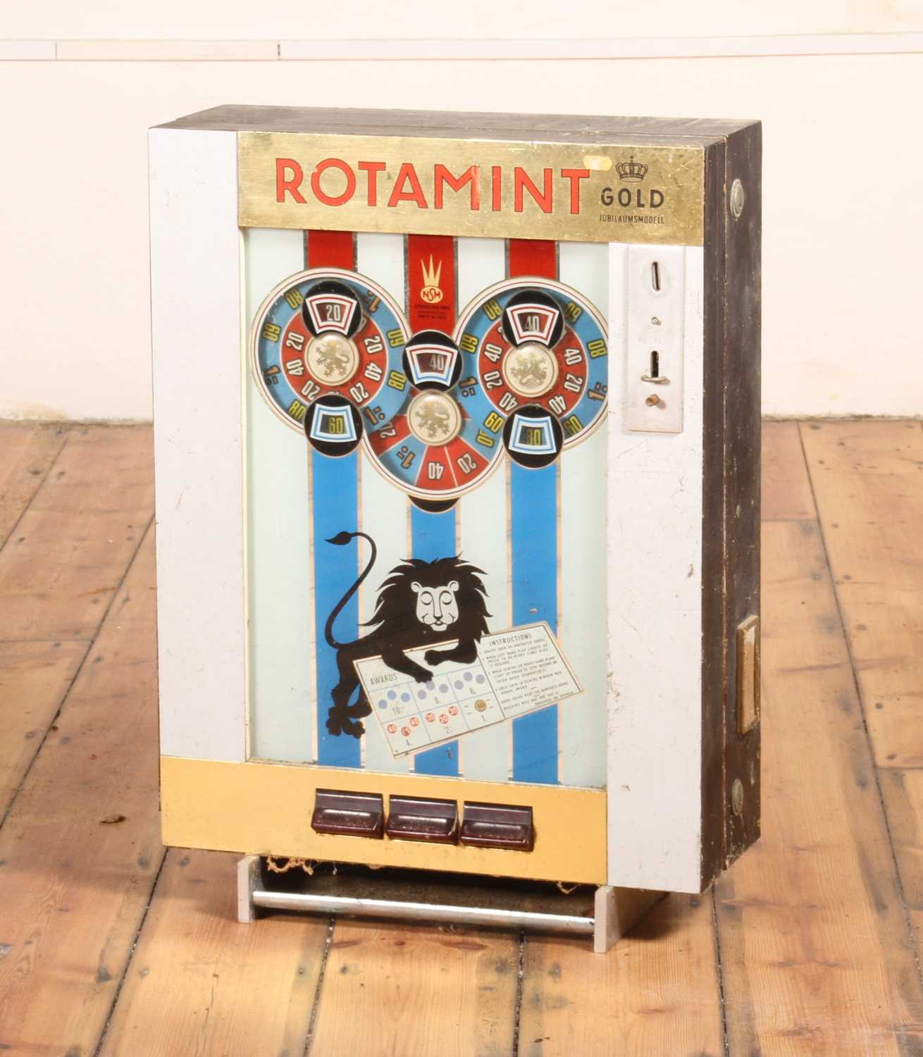 Lot 375 - A Rotamint wall-mounted slot machine/arcade