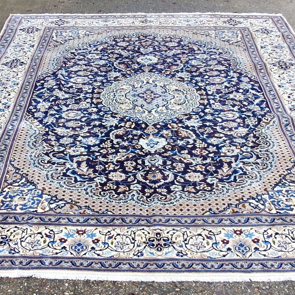 Lot 110 - A Persian Naeem carpet, with all over