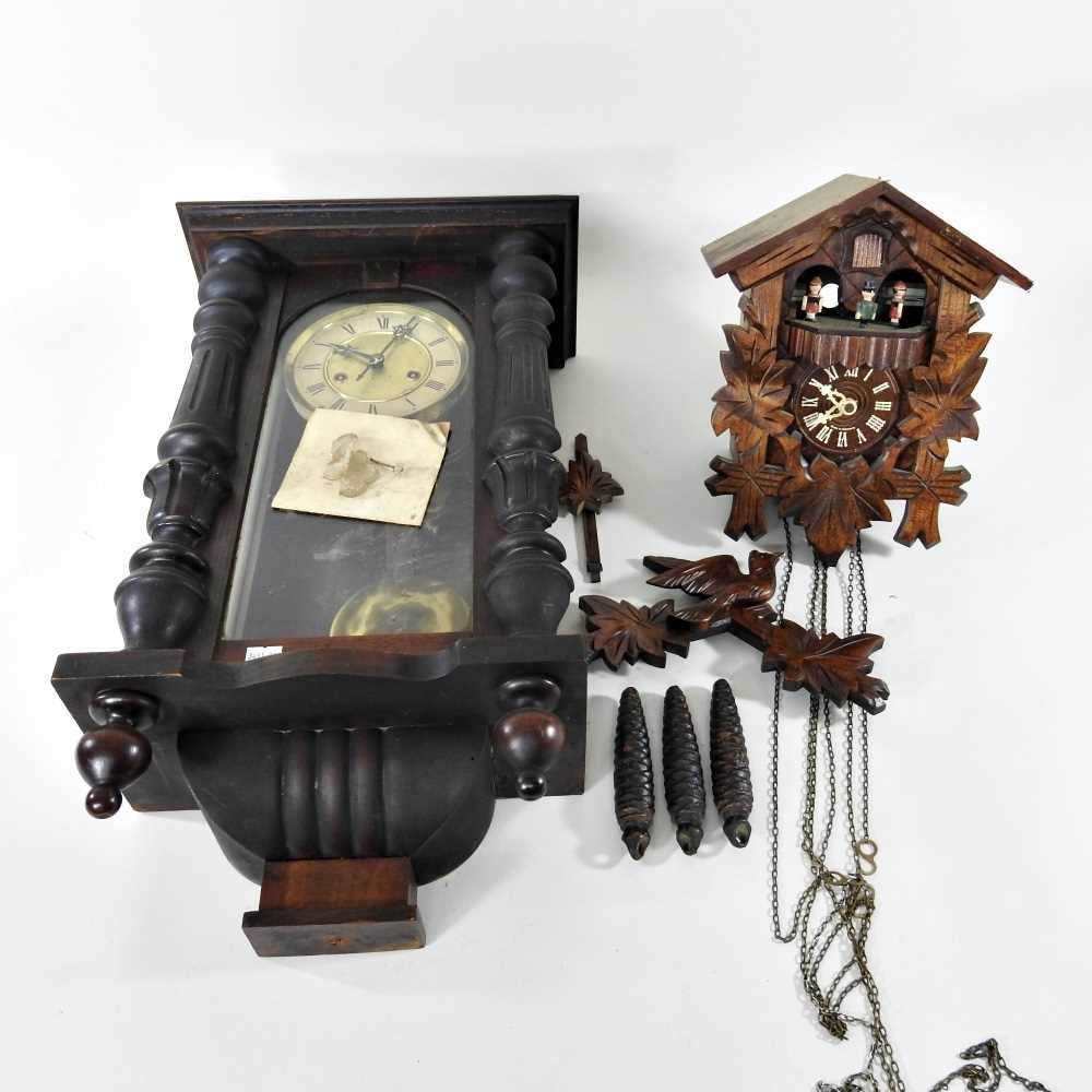 Lot 153 - A wooden cuckoo clock, together with a 19th