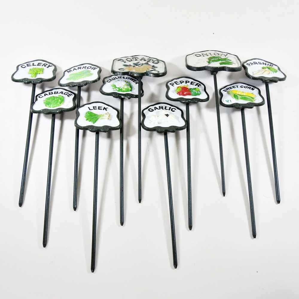 Lot 114 - A collection of painted metal vegetable