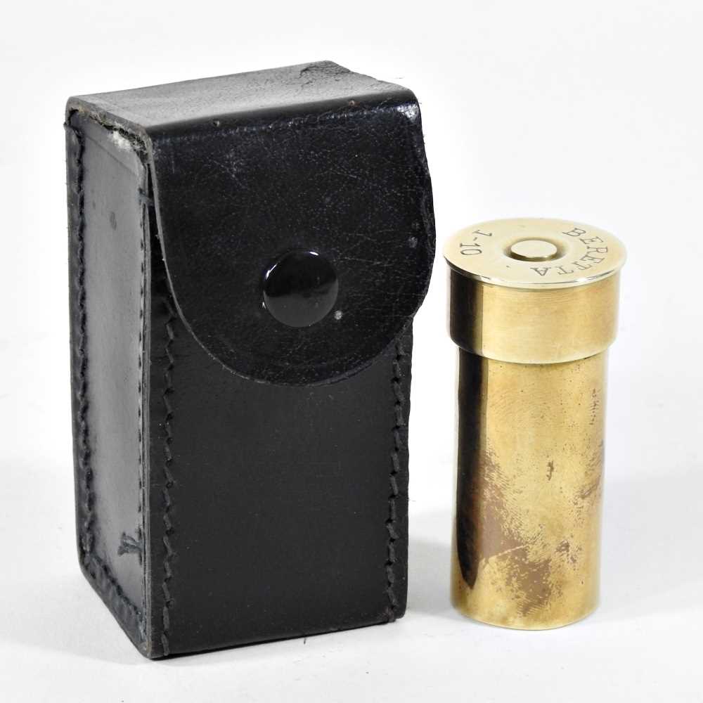 Lot 69 - A set of brass shooting pegs, in the form of