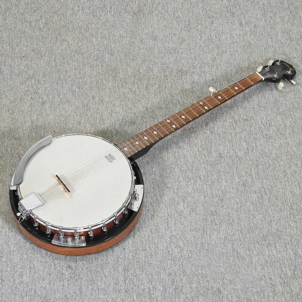 Lot 583 - A Stagg banjo