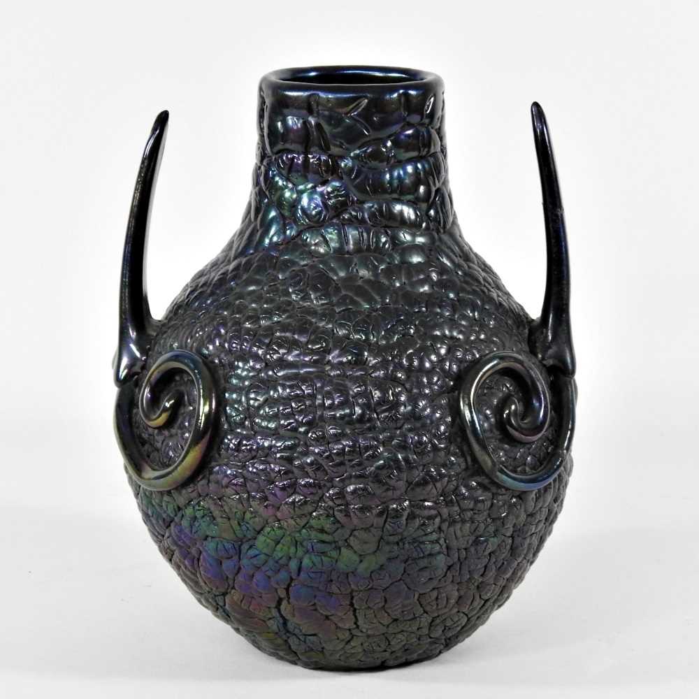 Lot 92 - A Loetz style iridescent bronzed glass vase,