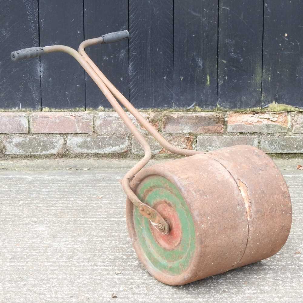 Lot 233 - A small iron garden roller