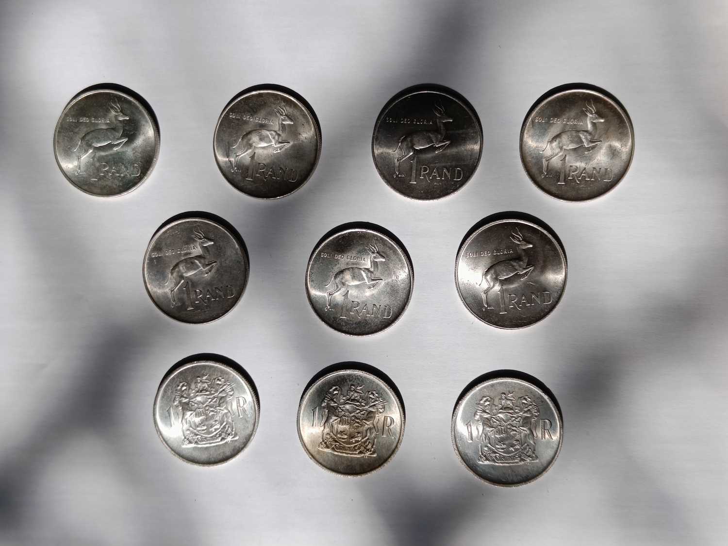 Lot 324 - South Africa, ten silver 1 Rand coins, dates