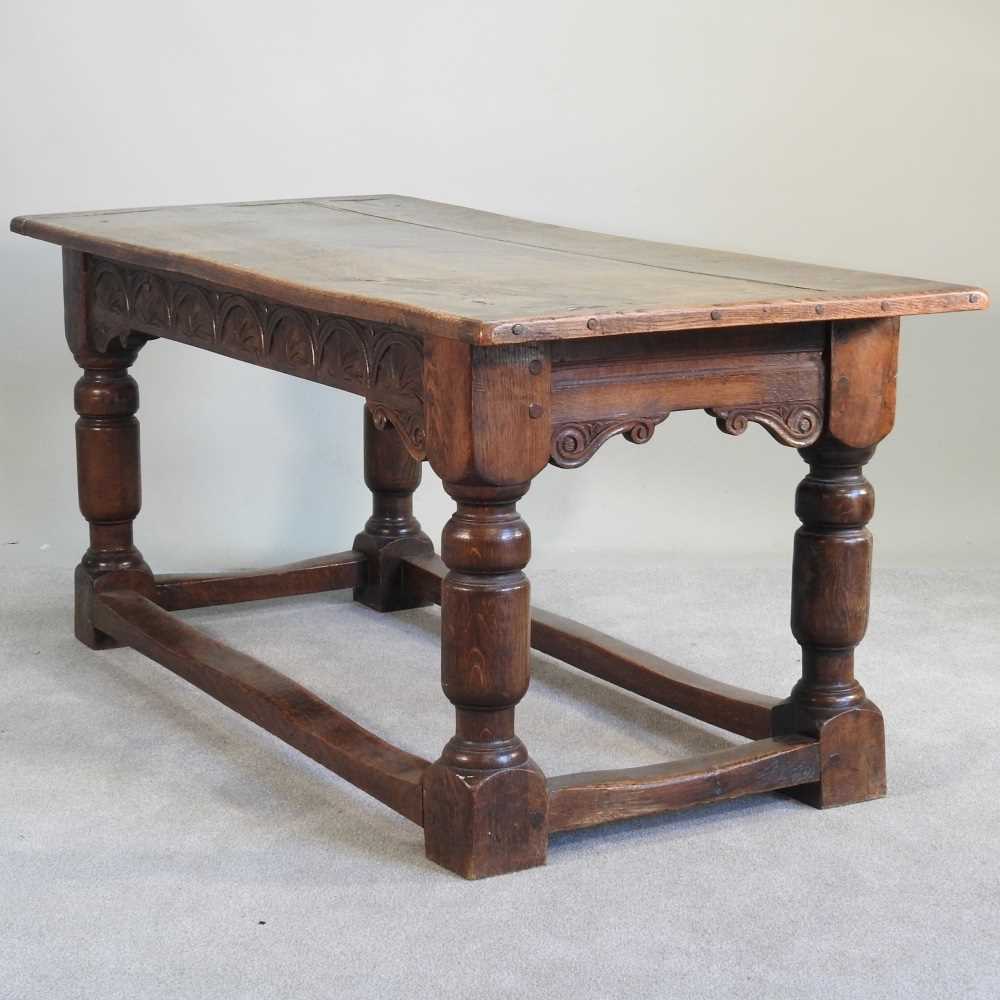 Lot 118 - A 17th century style oak refectory table,