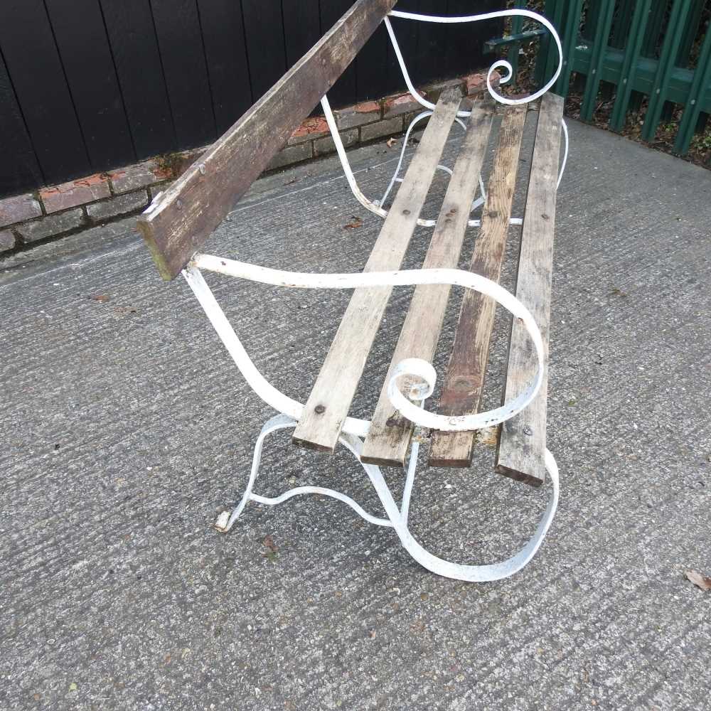 Lot 145 - A wooden garden bench, on white painted iron