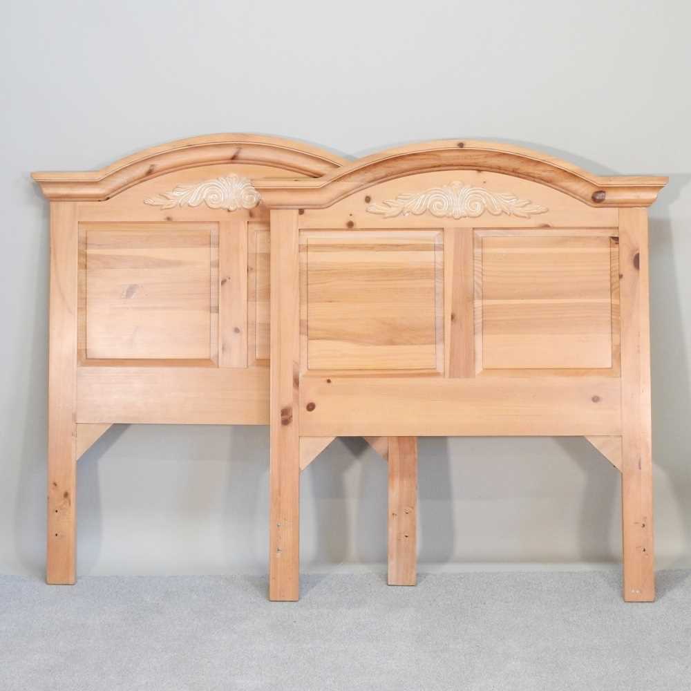 Lot 212 - A pair of pine single headboards (2)