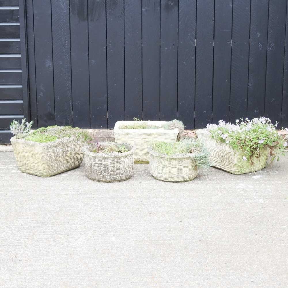 Lot 580 - Three cast stone garden troughs, of