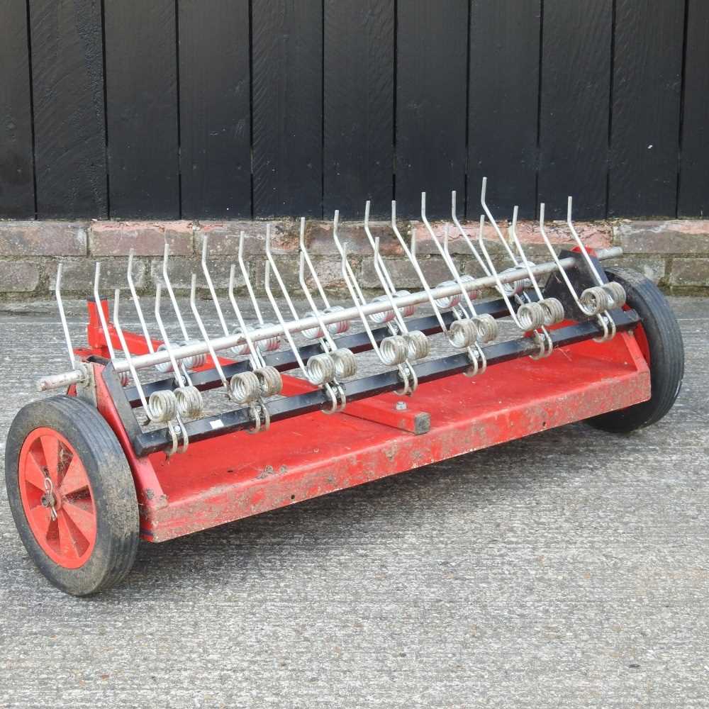 Lot 224 - A garden tractor lawn scarifier, 128cm wide