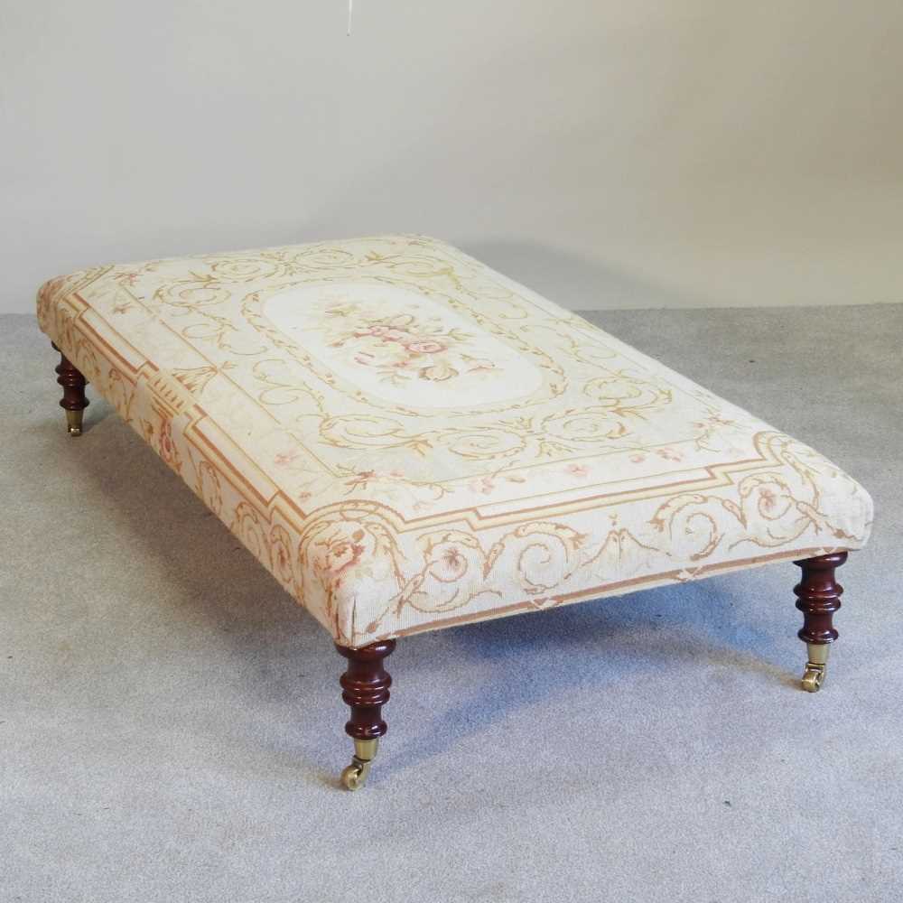 Lot 231 - A modern upholstered long footstool, on