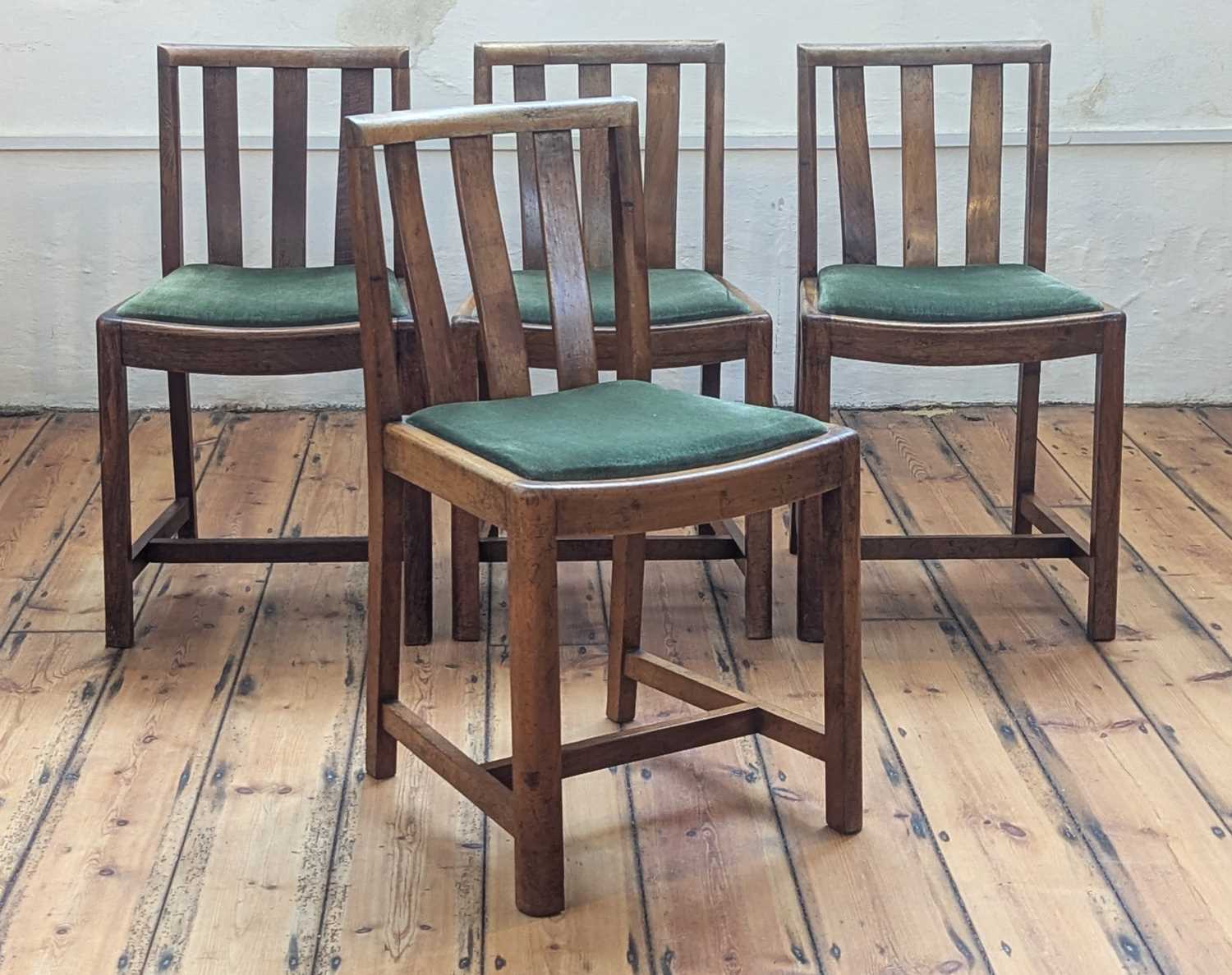 Lot 145 - A set of four mid 20th century Heals oak