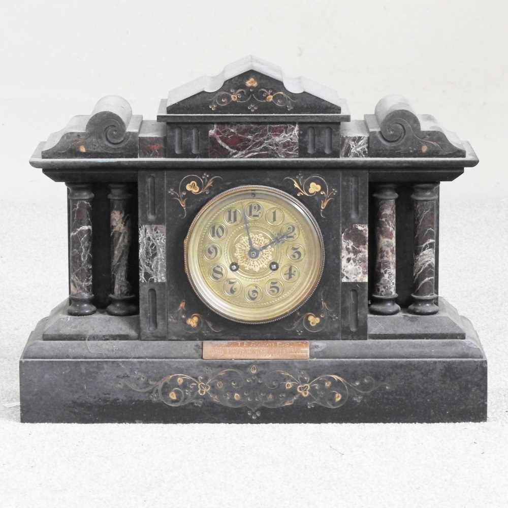 Lot 565 - A Victorian black slate mantel clock