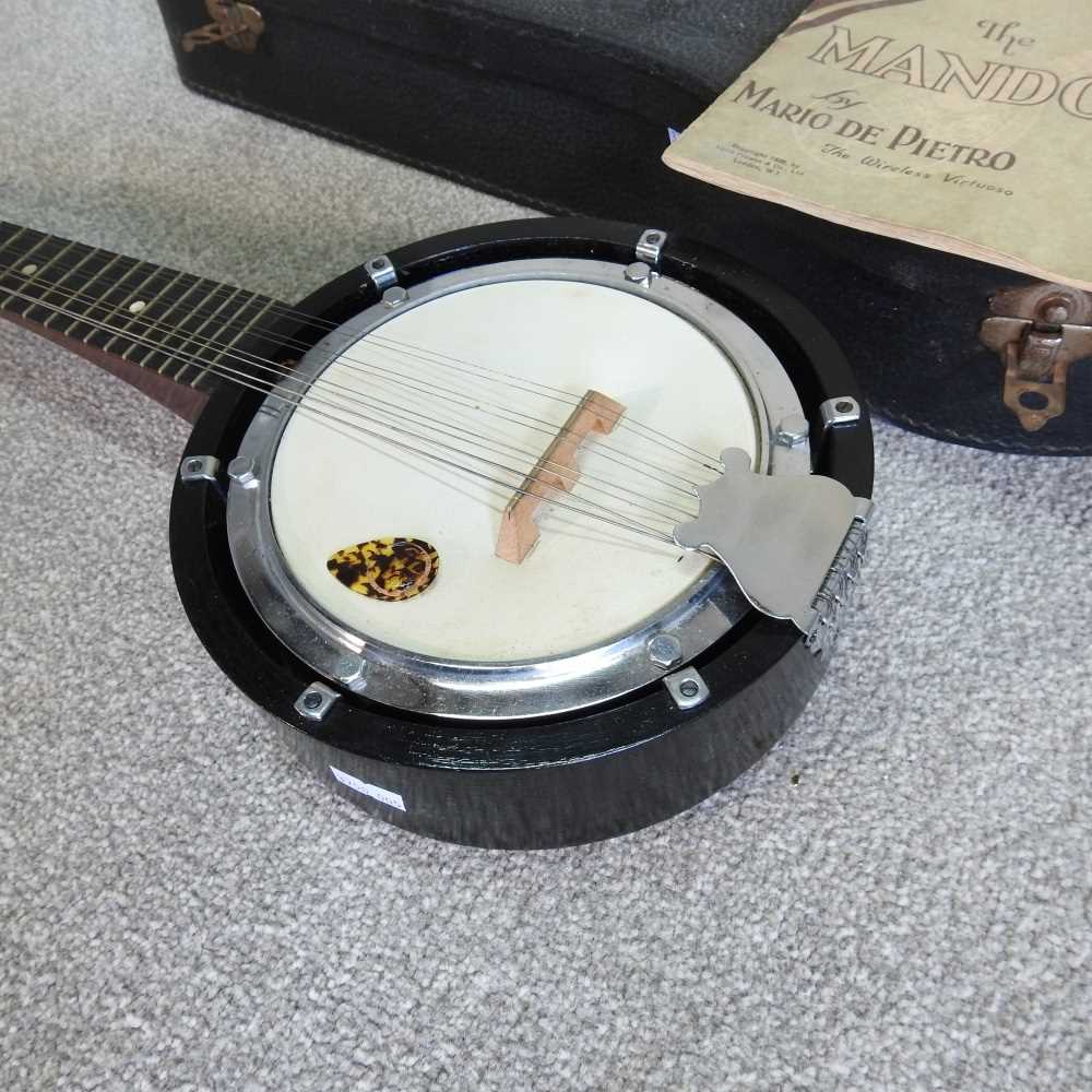 Lot 245 - A Bristish Made eight string banjo mandolin,