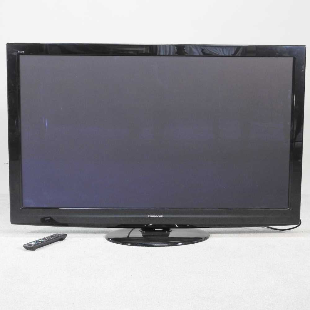 Lot 568 - A Panasonic television, 122cm wide, with