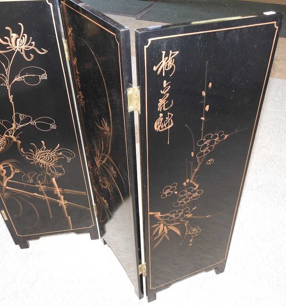 Lot 599 - A Japanese four-fold dressing screen