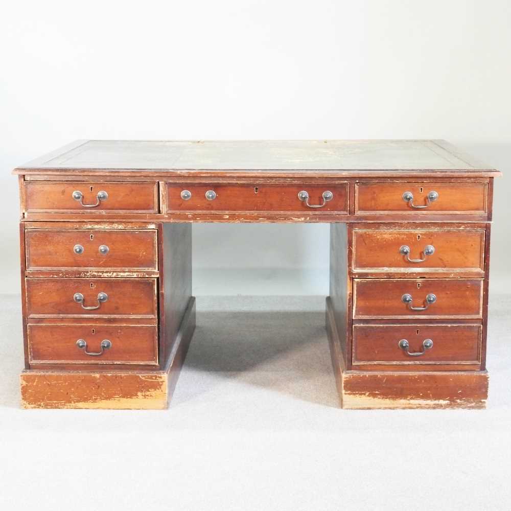 Lot 520 - A large reproduction partners pedestal desk,