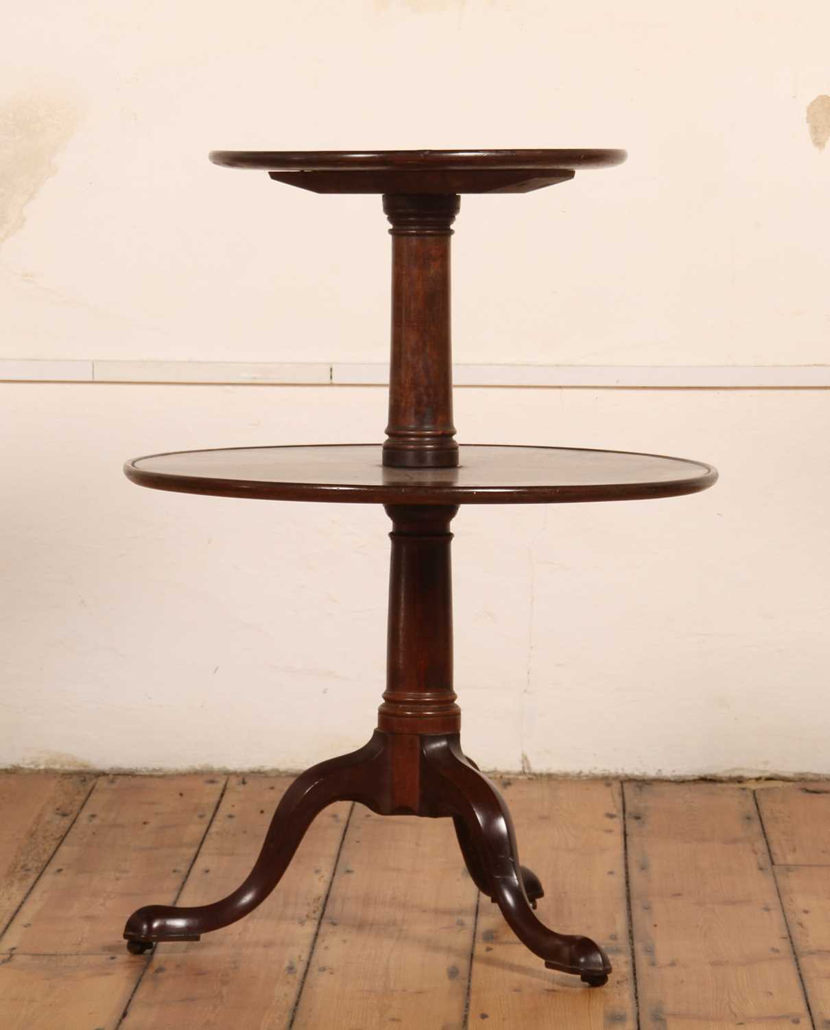 Lot 95 - A George III mahogany dumbwaiter, on a gun