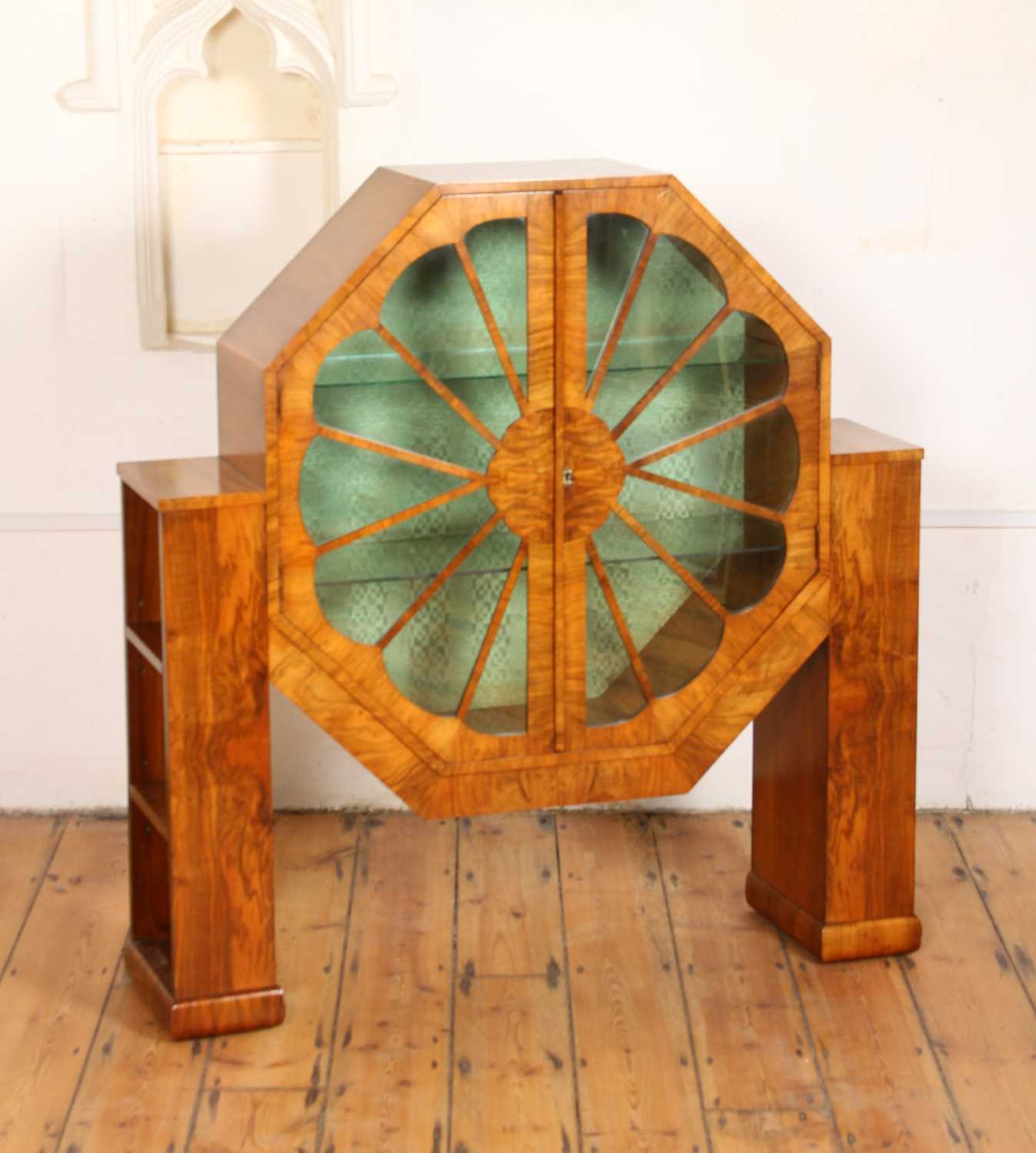 Lot 7 - An Art Deco walnut octagonal display cabinet,
