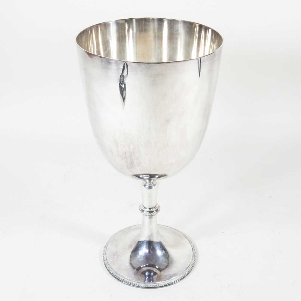 Lot 45 - A large silver plated trophy cup, engraved