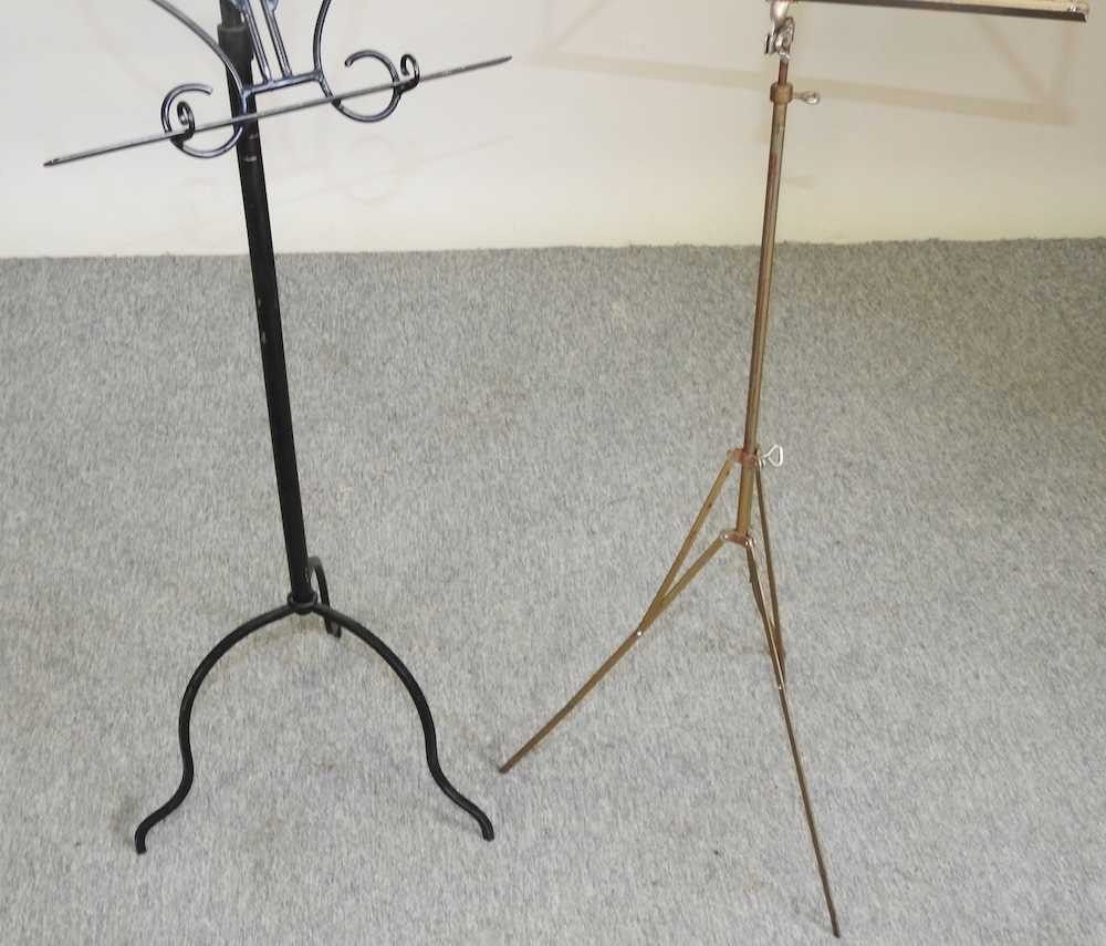 Lot 520 - A black painted metal music stand