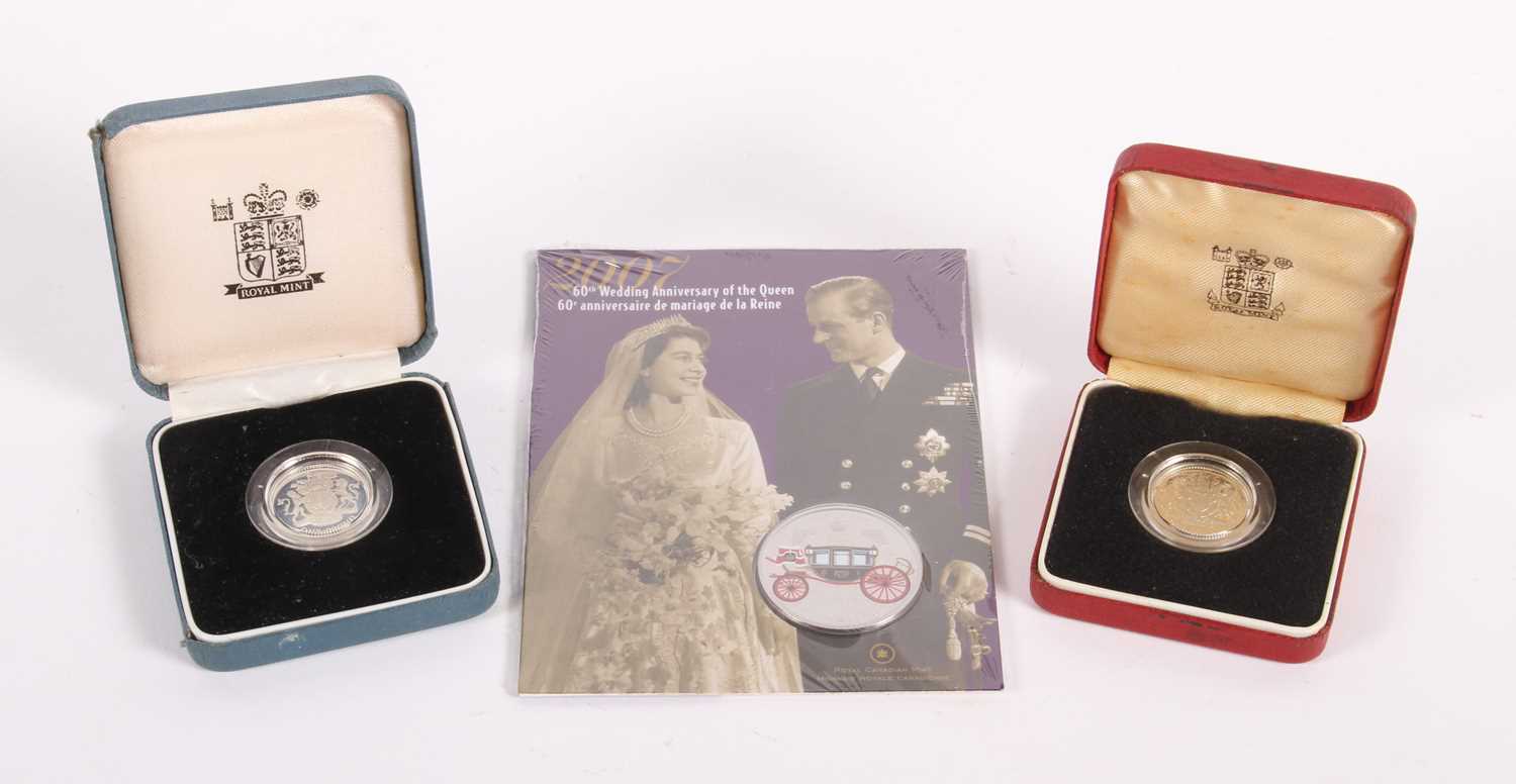 Lot 142 - Two 1983 silver proof one pound coins, cased,