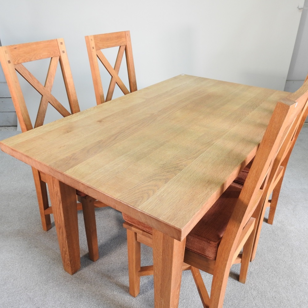 Lot 285 - A modern light oak dining table, together