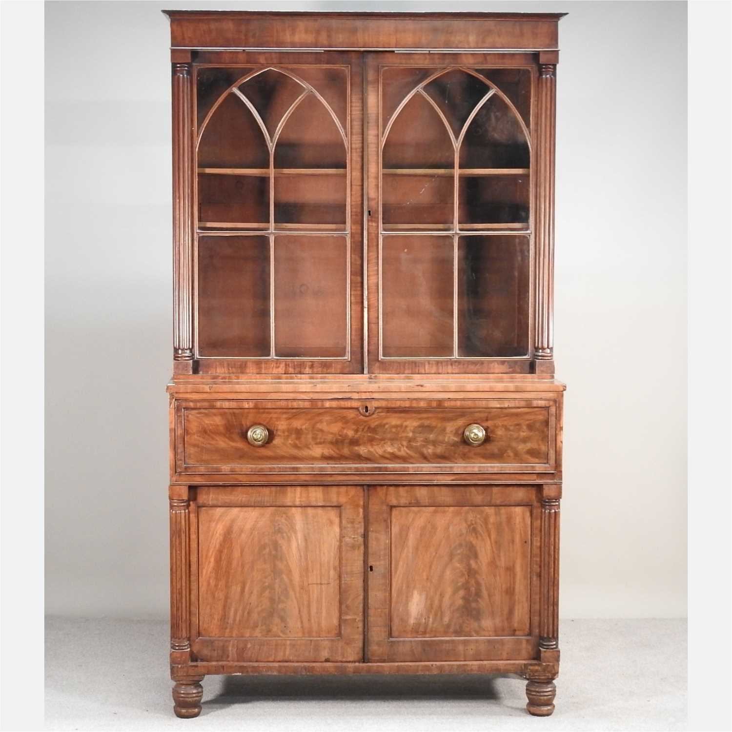 Lot 421 - A George III mahogany secretaire bookcase,