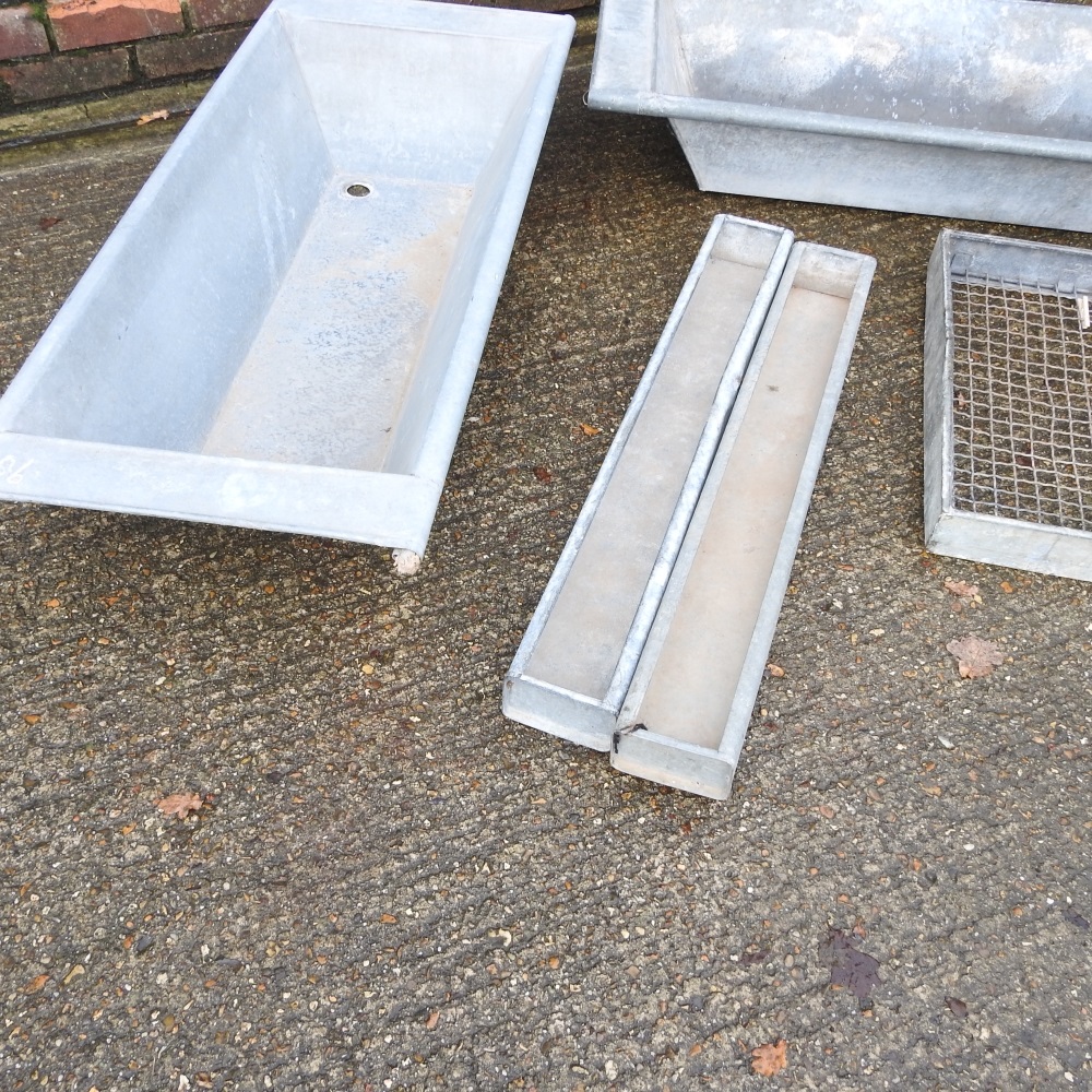 Lot 377 - A pair of galvanised troughs, each 122cm